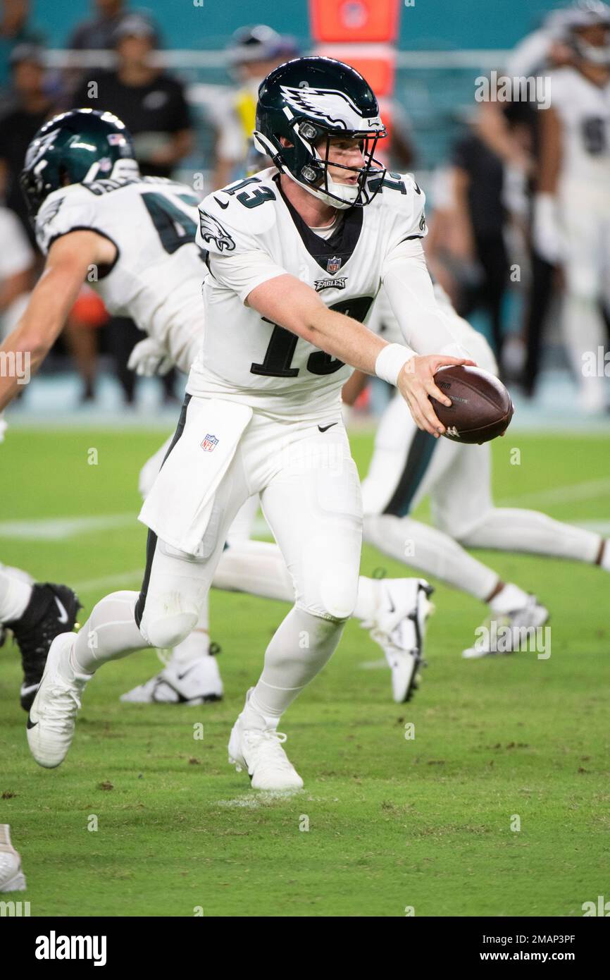 Philadelphia Eagles quarterback Reid Sinnett (13) hands off the ball ...