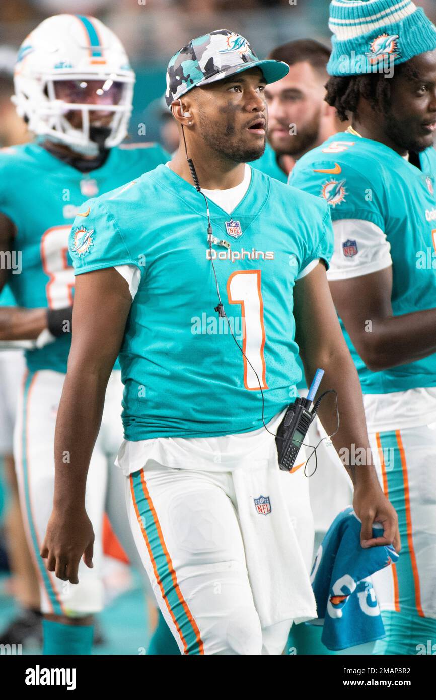 Miami Dolphins quarterback Tua Tagovailoa (1) walks on the sidelines ...