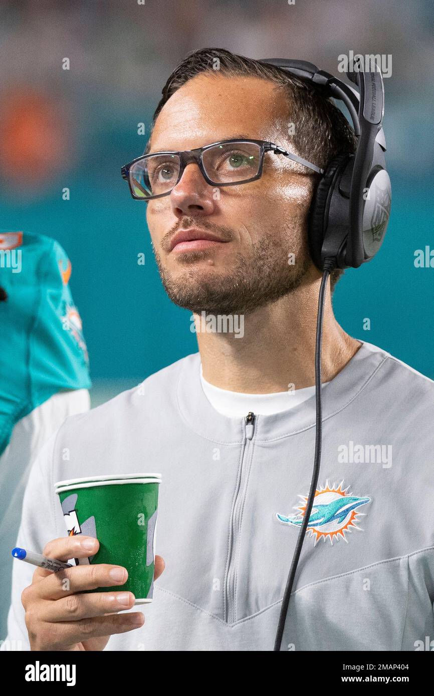 Miami Dolphins head coach Mike McDaniel watches a replay from the sidelines during an NFL ...