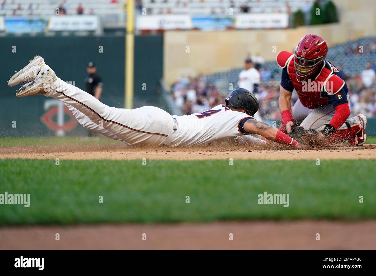 Minnesota Twins' Jose Miranda beats the tag by Boston Red Sox catcher ...