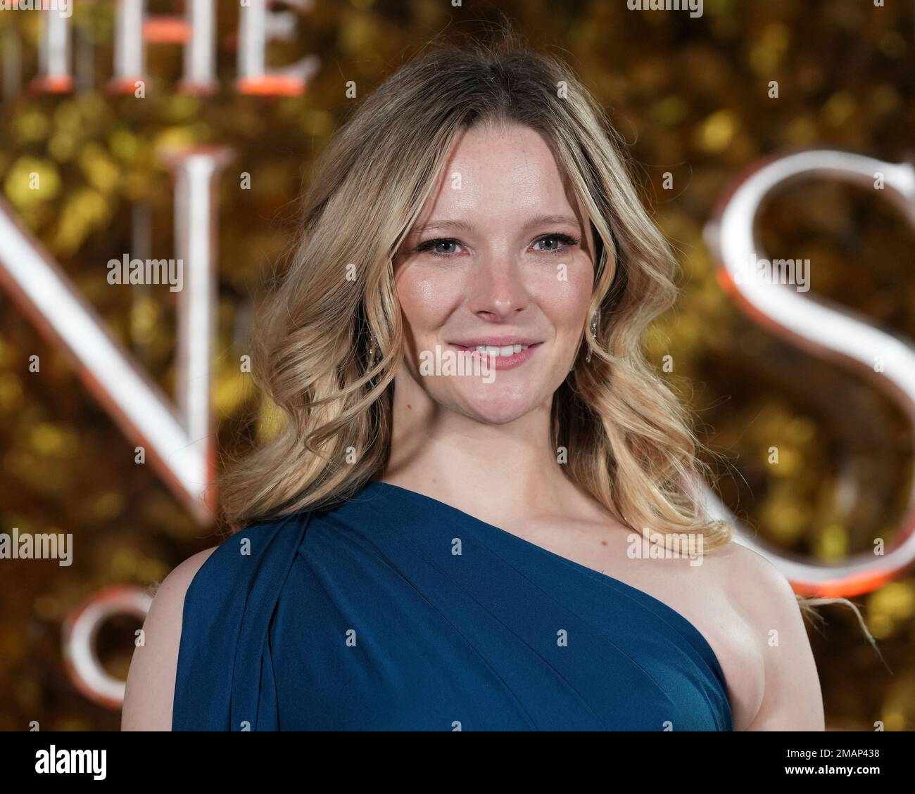 Morfydd Clark poses for photographers upon arrival at the afterparty of ...
