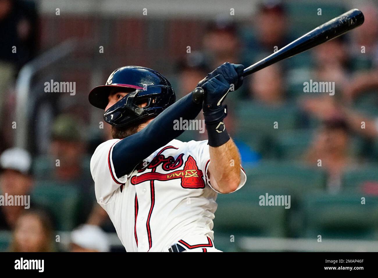 Atlanta Braves' Dansby Swanson watches his RBI double in the second ...