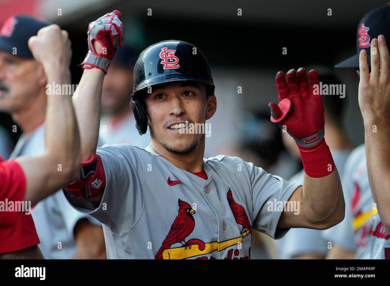 St. Louis Cardinals' Tommy Edman is congratulated after his solo home ...