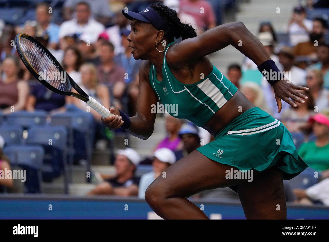 Venus Williams, of the United States, chases down a shot from Alison ...
