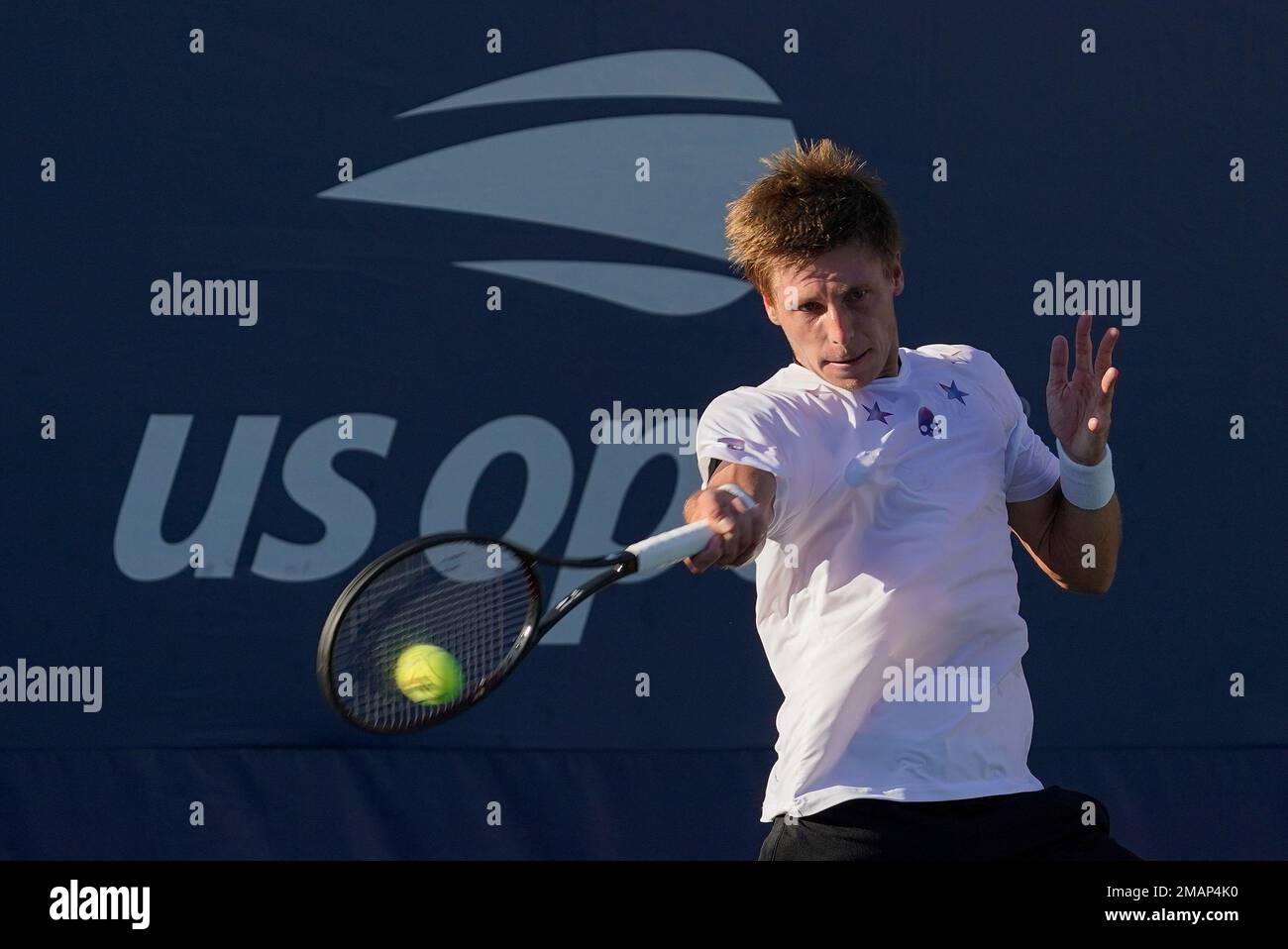 Ilya Ivashka, of Belarus, returns a shot to Sam Querrey, of the United ...