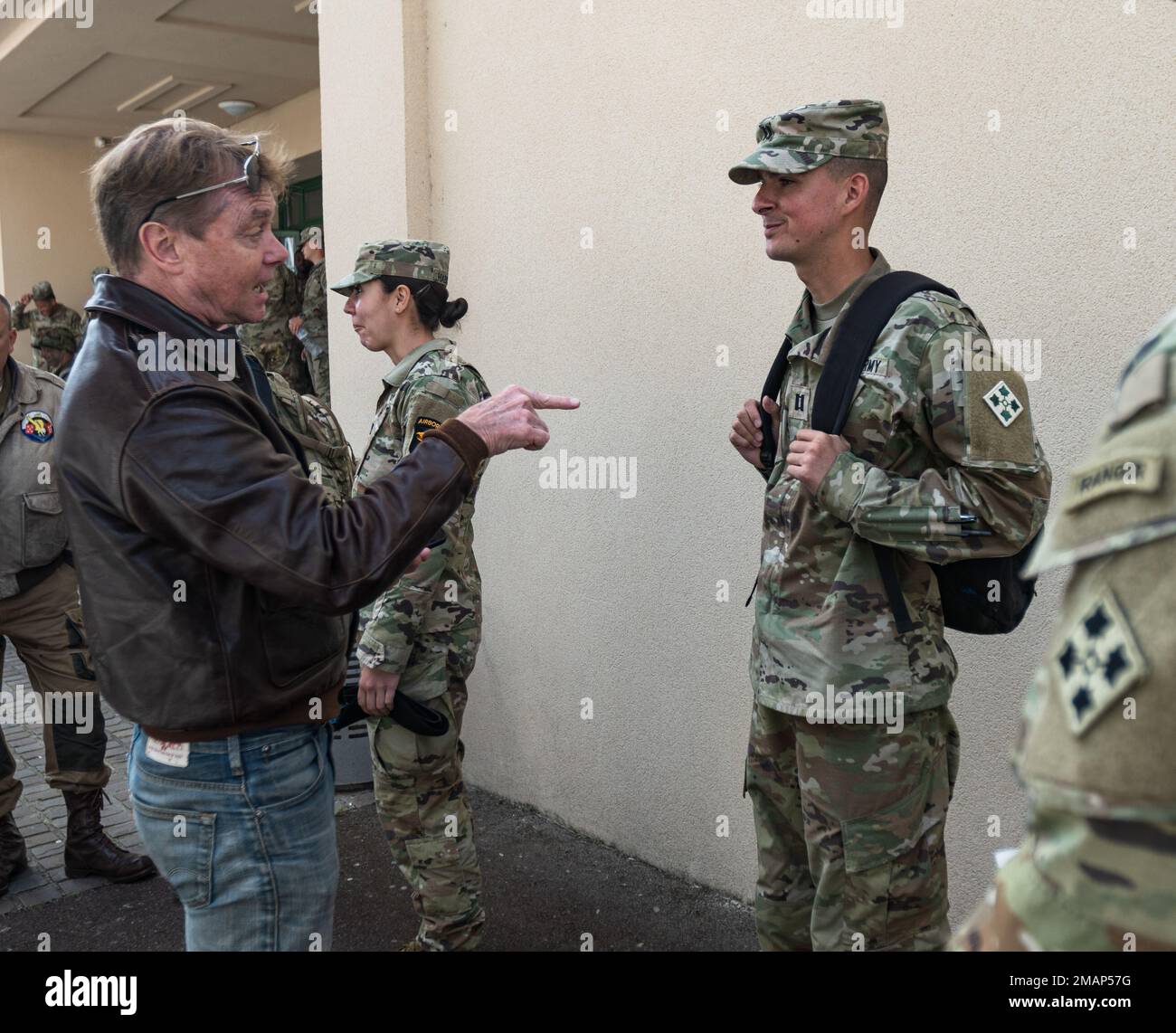 Denis Van Denbrink, a volunteer tour guide, welcomes U.S. Army Capt ...