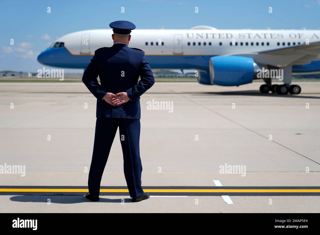 Col. Matthew Jones, Commander, 89th Airlift Wing, stands at attention ...