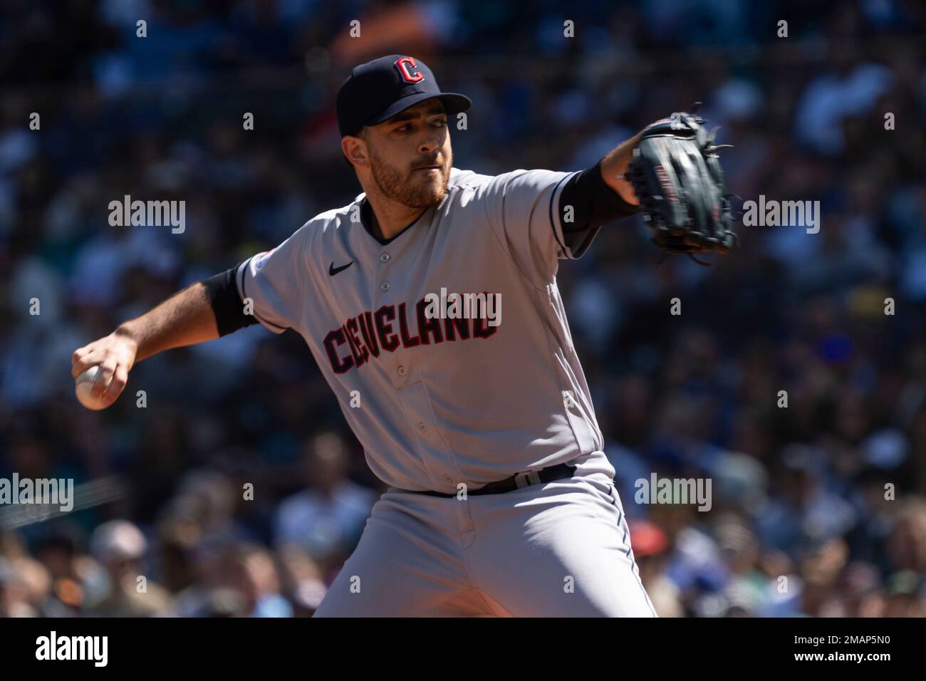 Cleveland Guardians starter Aaron Civale delivers a pitch during a ...