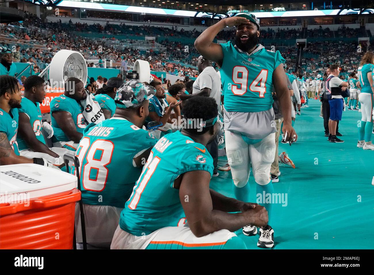 Miami Dolphins defensive tackle Christian Wilkins (94) jokes with ...