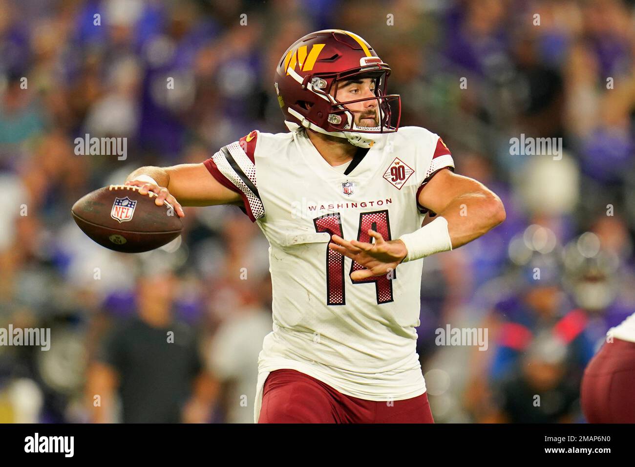 Washington Commanders quarterback Sam Howell (14) throws a pass against ...