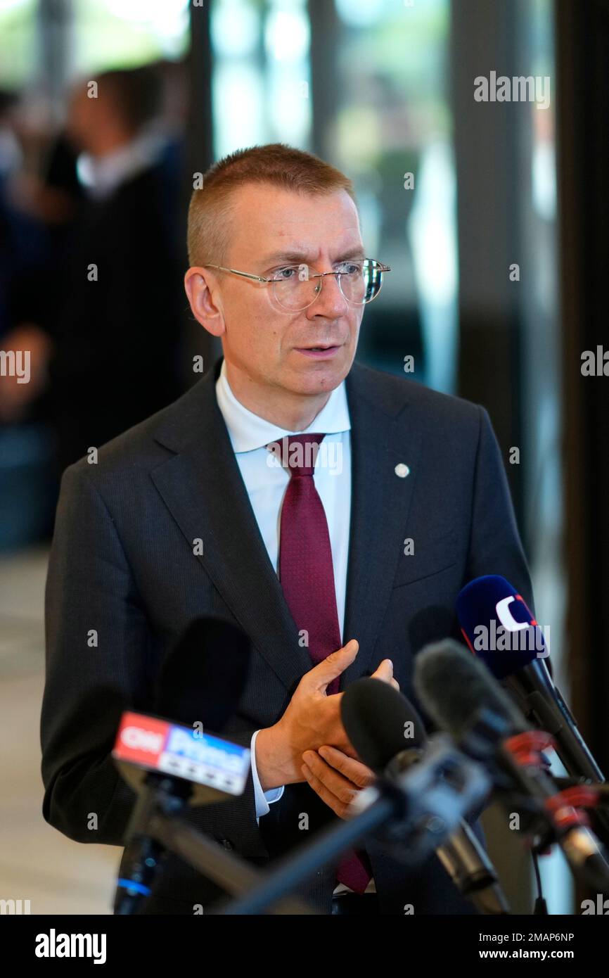 Latvia's Foreign Minister Edgars Rinkevics speaks with the media as he ...