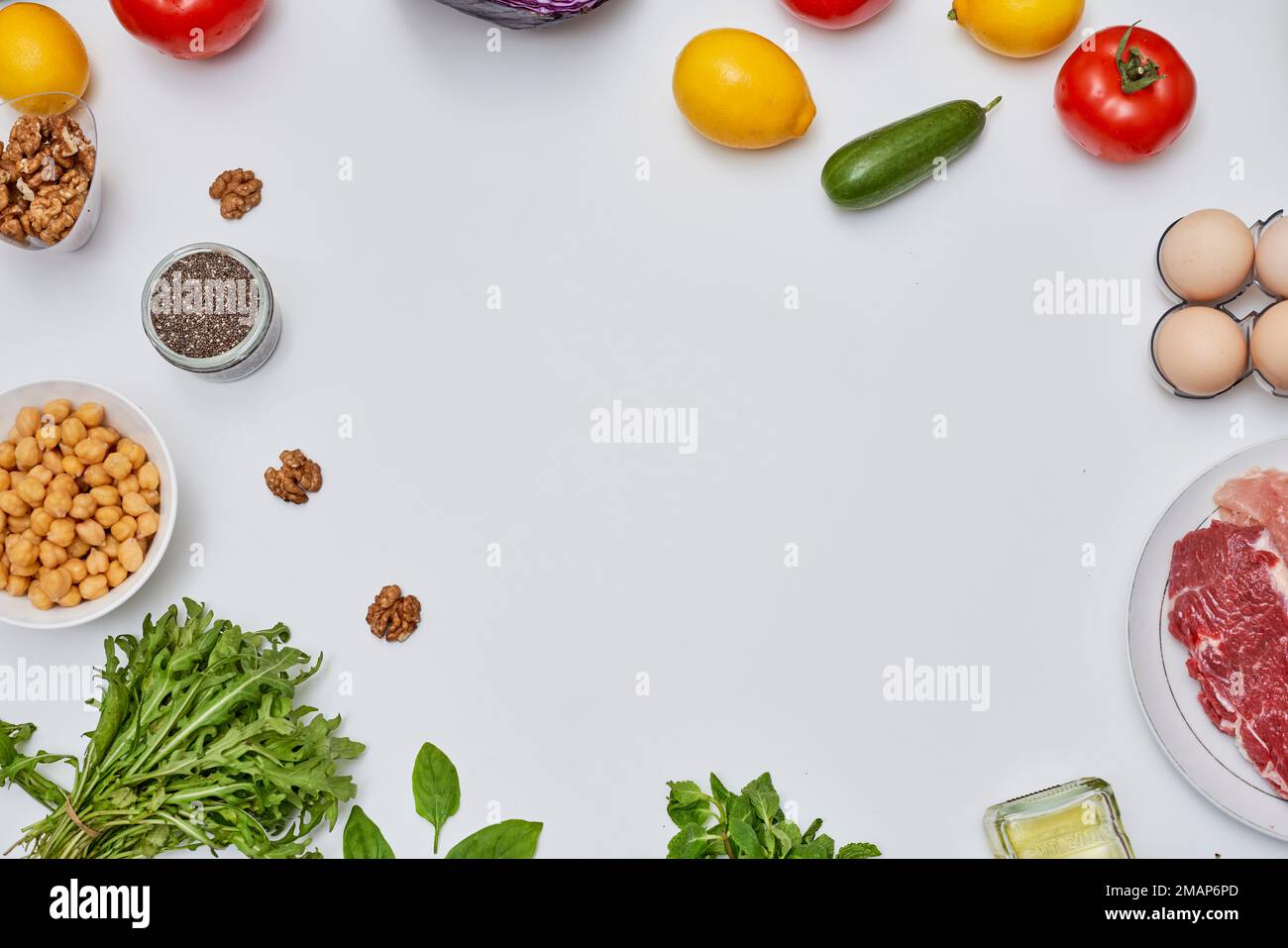 food on a white surface with space in the middle to be used for an ...