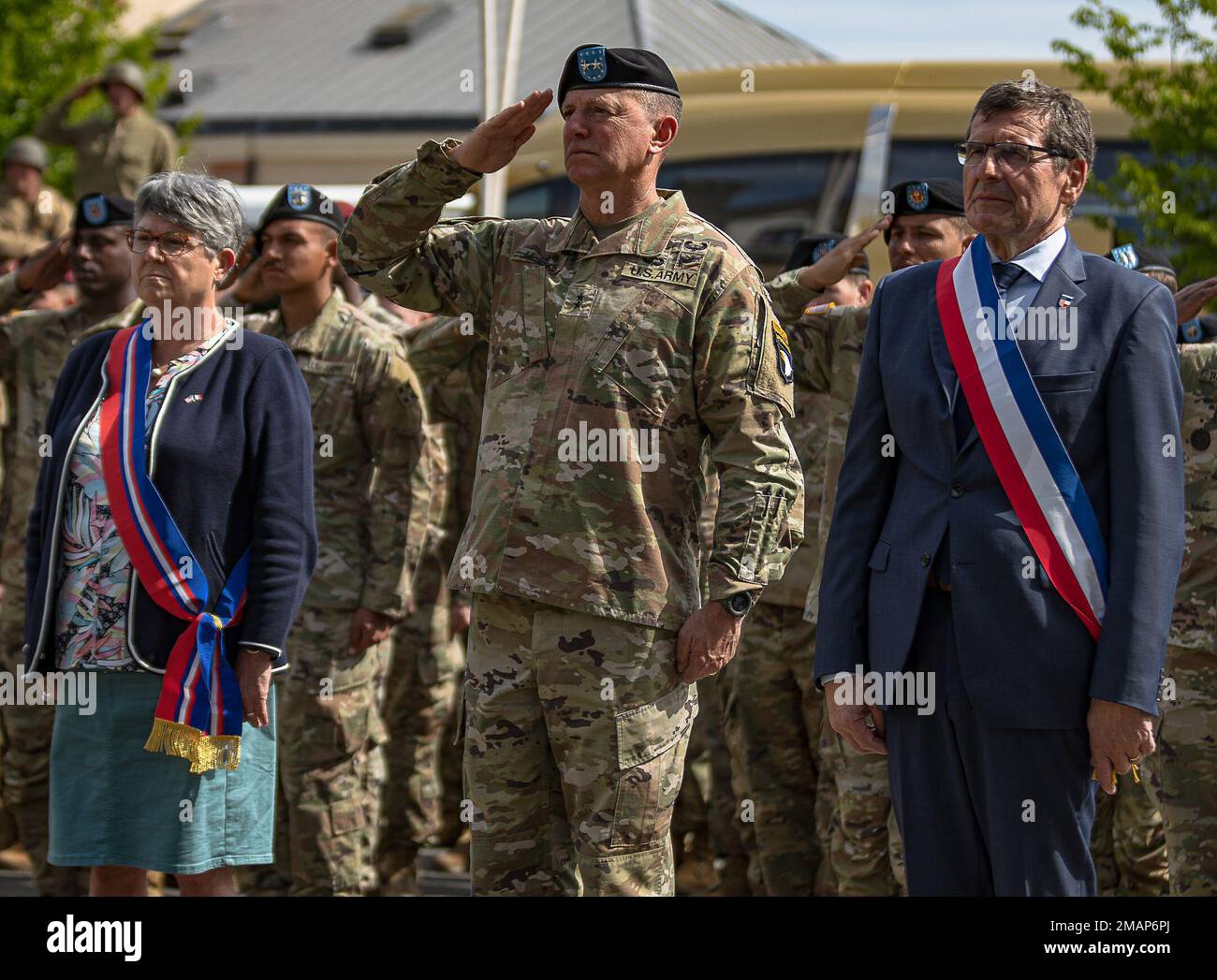 The Mayor of Carentan, Jean-Pierre L’honneur (right), U.S. Army Maj ...