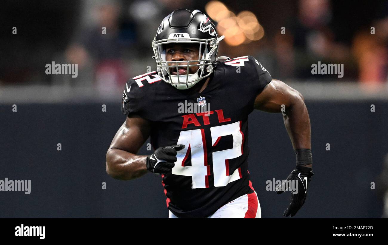 Atlanta Falcons running back Caleb Huntley (42) runs against the ...