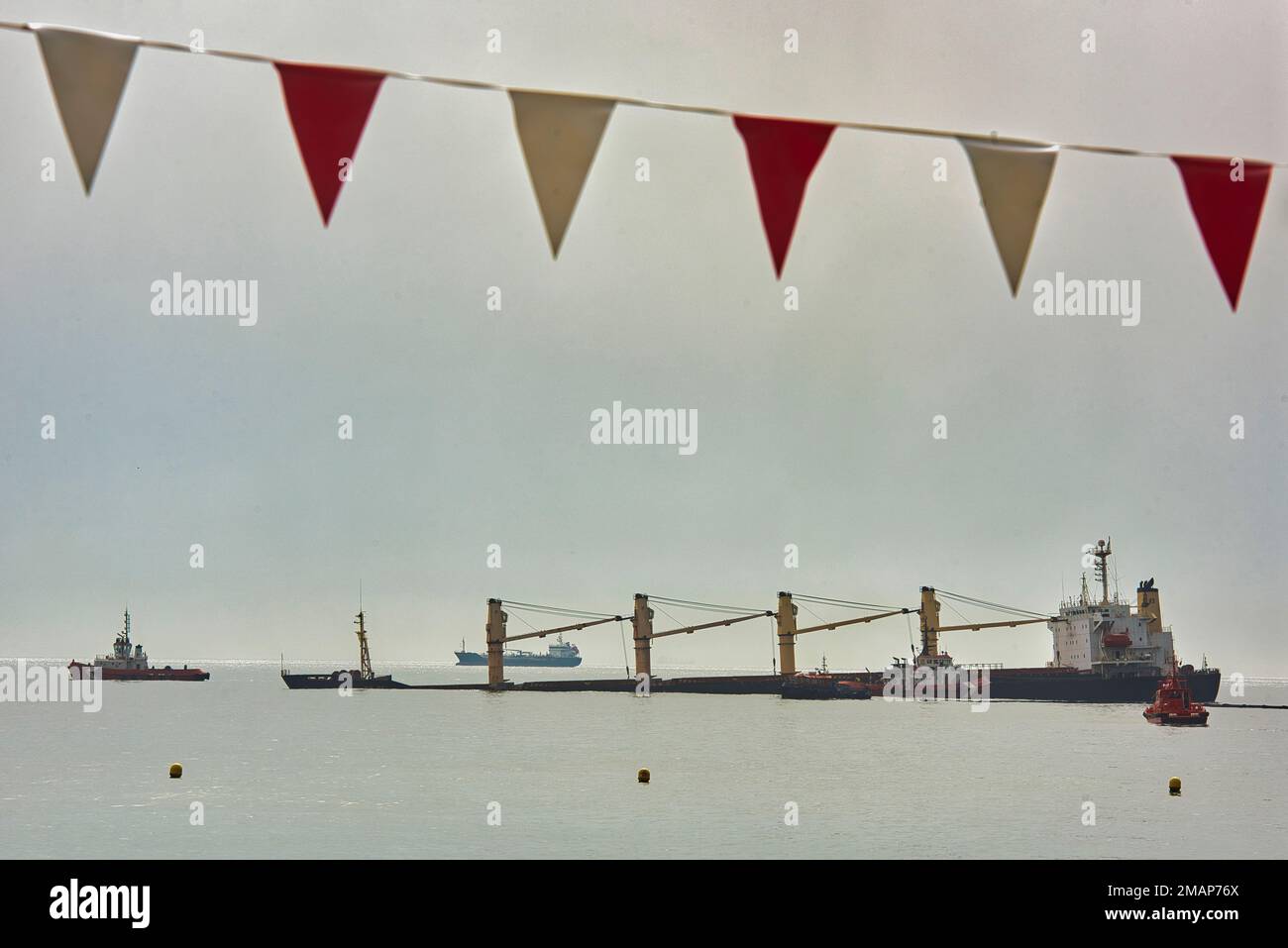 The Tuvalu-registered OS 35 cargo ship lies on the seabed, off the ...