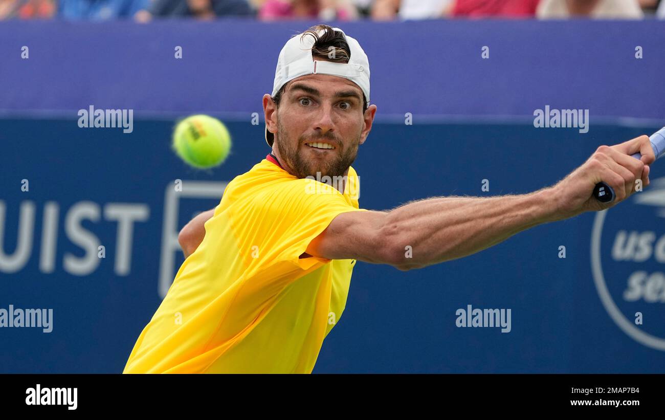 Maxime Cressy returns a shot to Adrian Mannarino, of France, during the ...