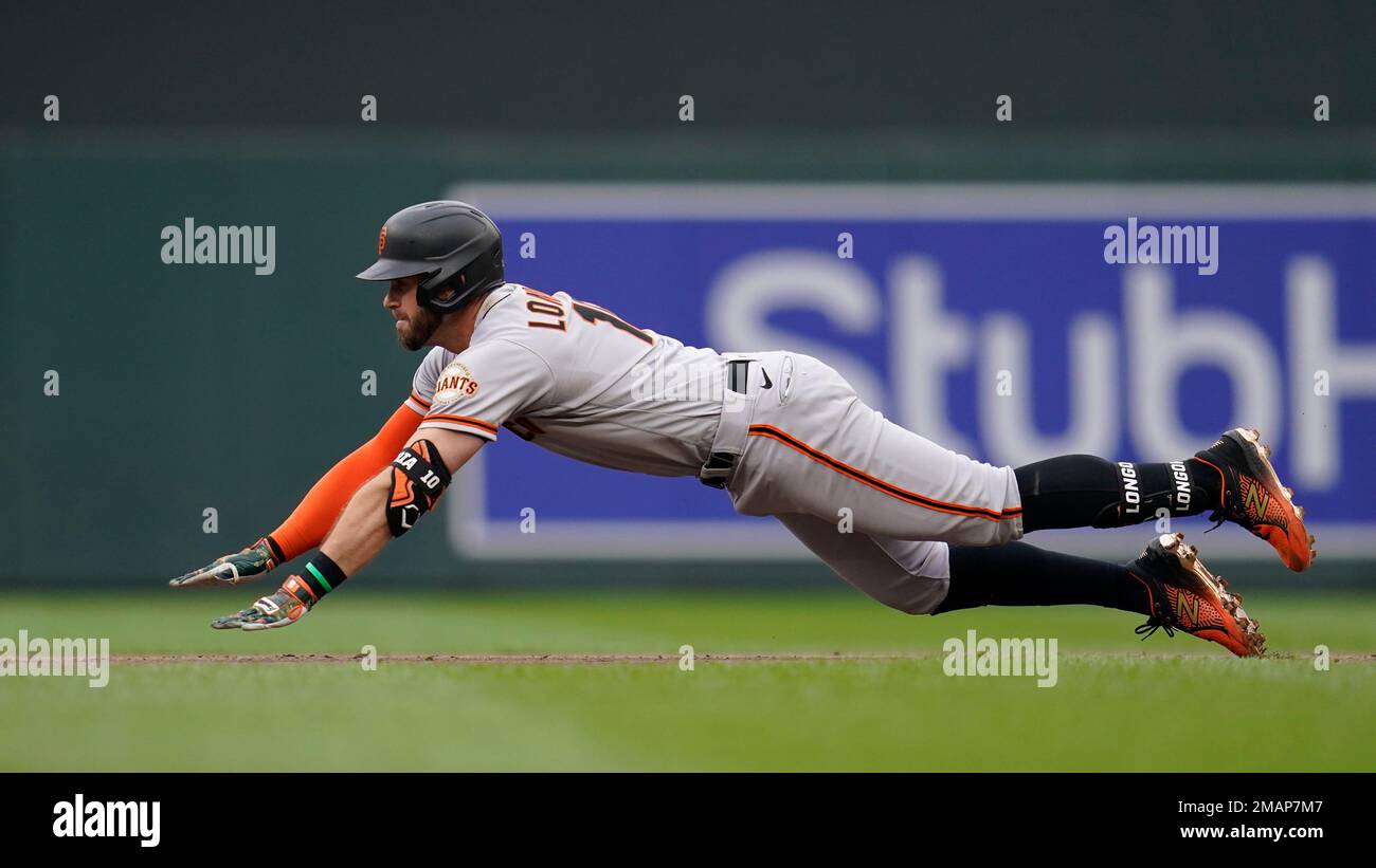 San Francisco Giants' Evan Longoria slides into second base after ...