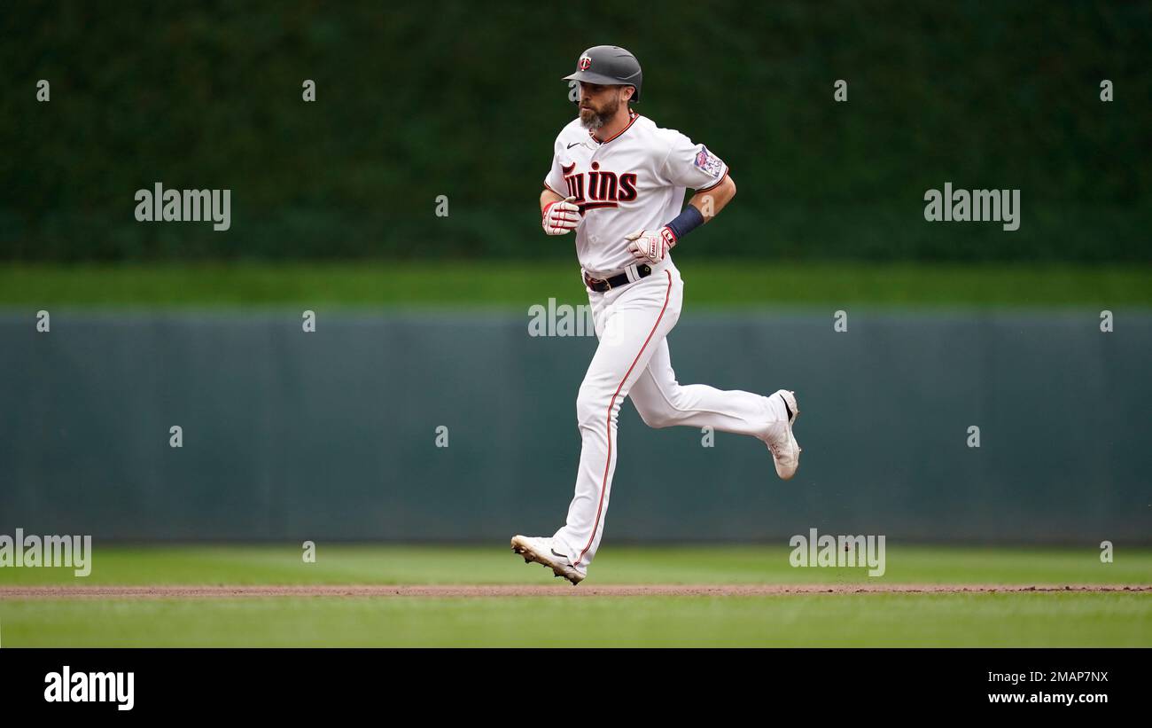 Minnesota Twins' Jake Cave runs the bases after hitting a two-run home ...