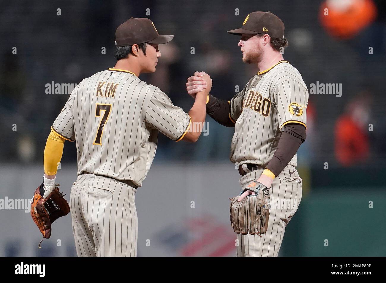 San Diego Padres' Ha-Seong Kim, left, celebrates with Jake Cronenworth ...