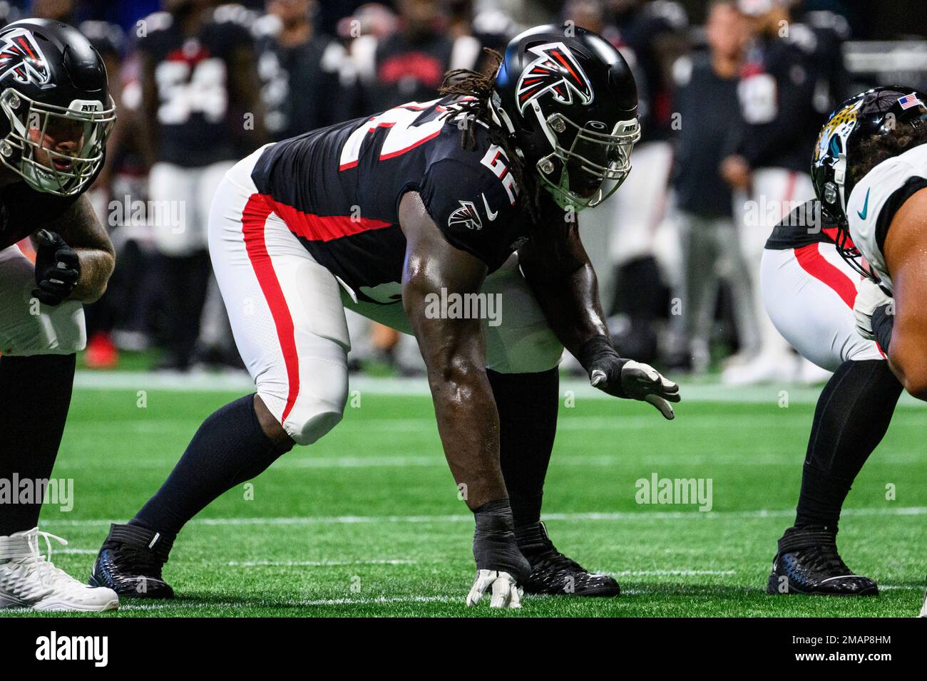 Atlanta Falcons center Jonotthan Harrison (62) lines up during the ...