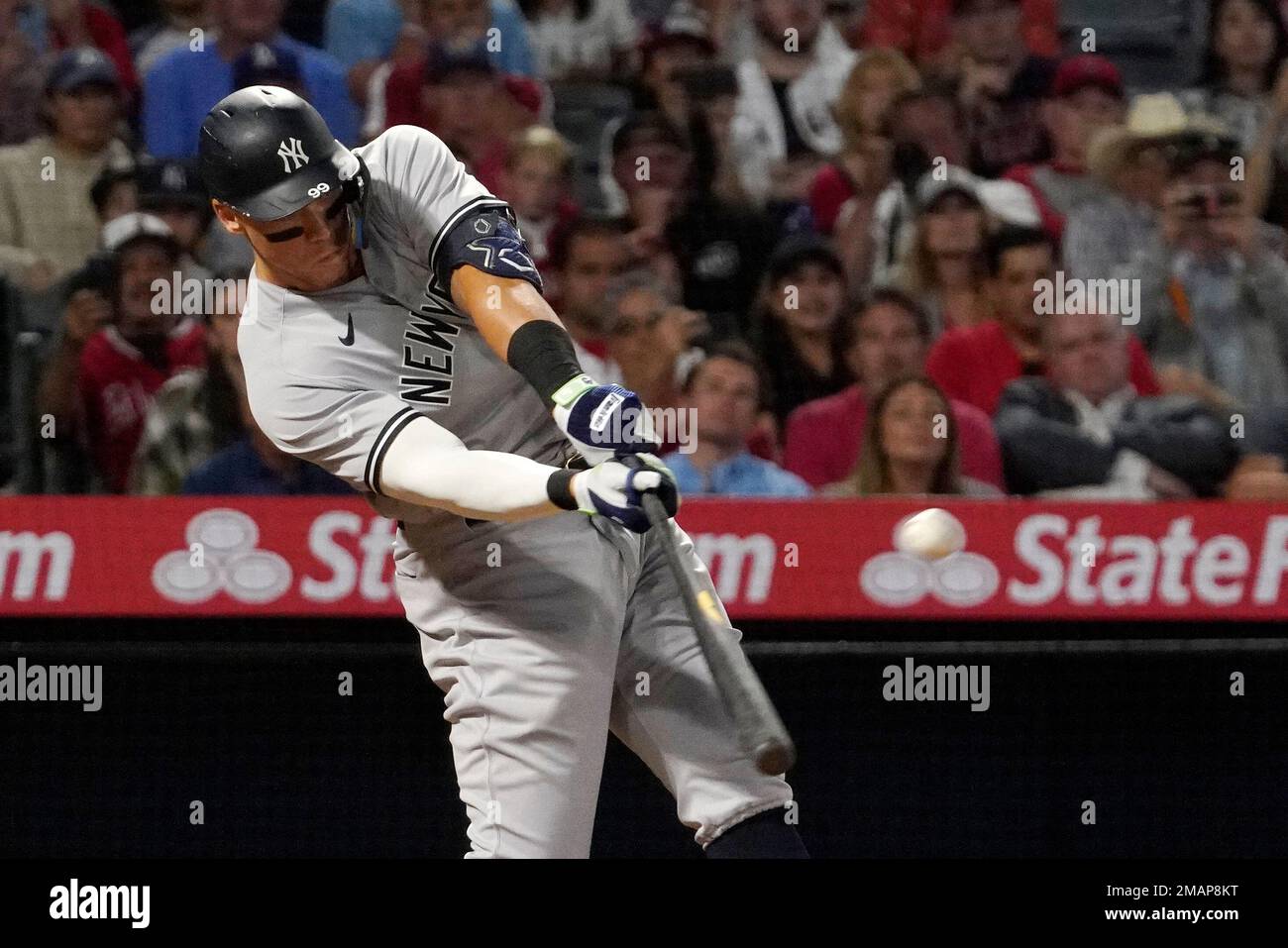 New York Yankees' Aaron Judge hits a solo home run during the eighth inning of a baseball game ...