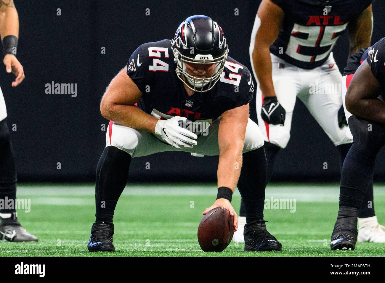 Atlanta Falcons guard Ryan Neuzil (64) lines up during the first half ...