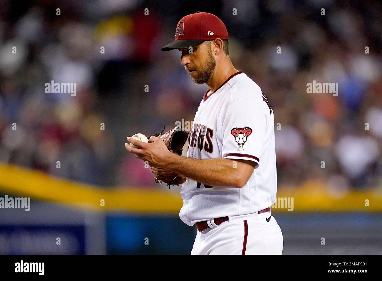 Arizona Diamondbacks starting pitcher Madison Bumgarner looks at the ...