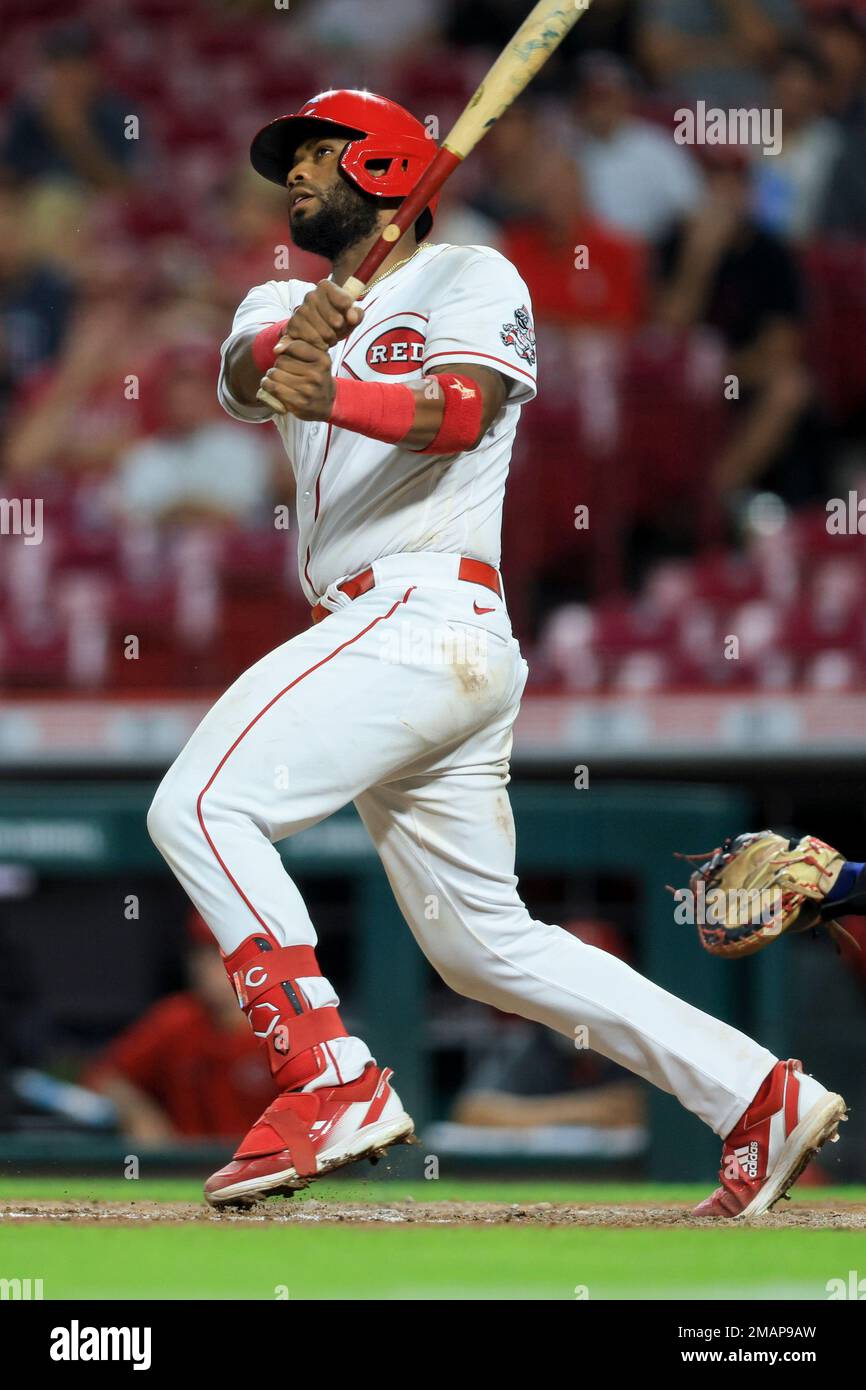 Cincinnati Reds' Chuckie Robinson watches his two-run home run during ...