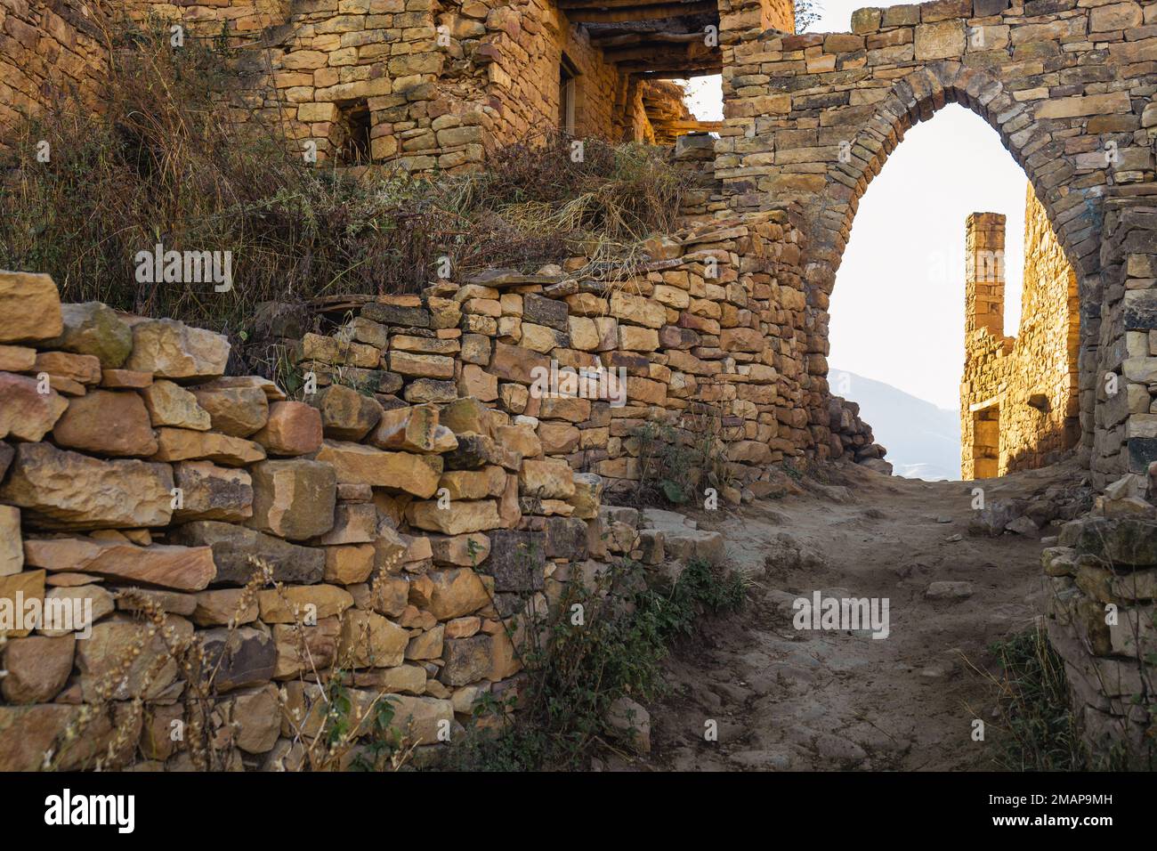 beautiful stone arch in the ruins of the abandoned ancient village of ...