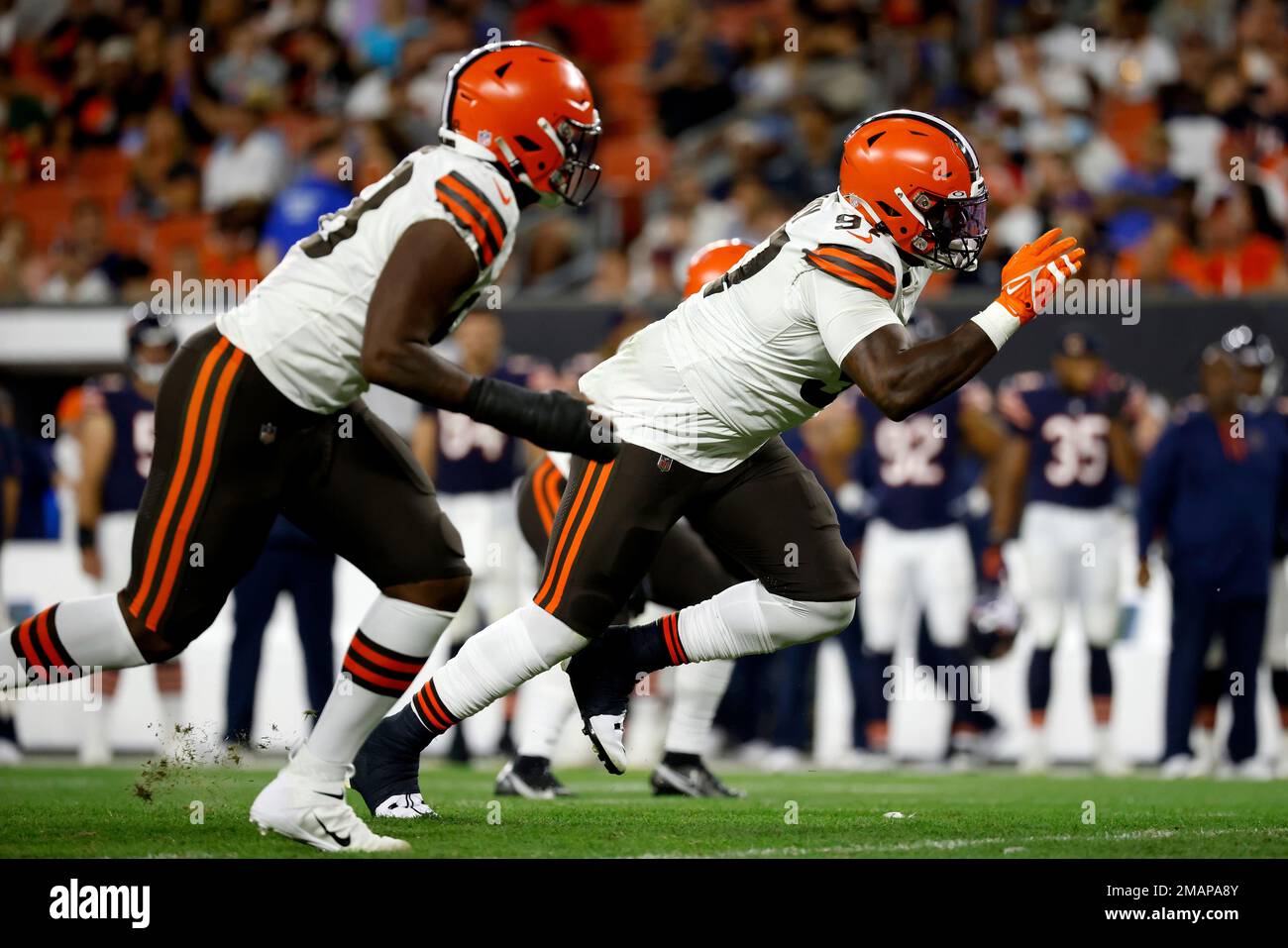 Cleveland Browns defensive tackle Perrion Winfrey (97) runs off of the ...