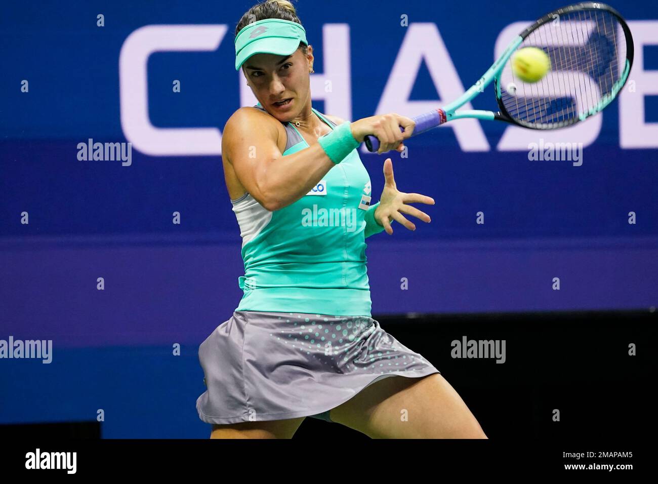 Danka Kovinic, of Montenegro, returns a shot to Serena Williams, of the ...