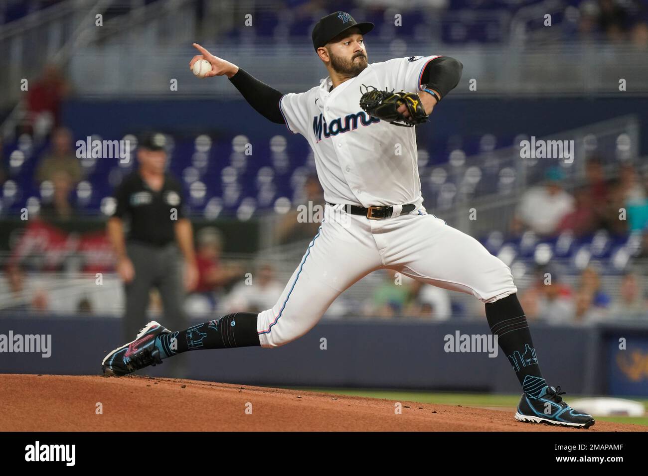 Miami Marlins starting pitcher Pablo Lopez aims a pitch during the ...