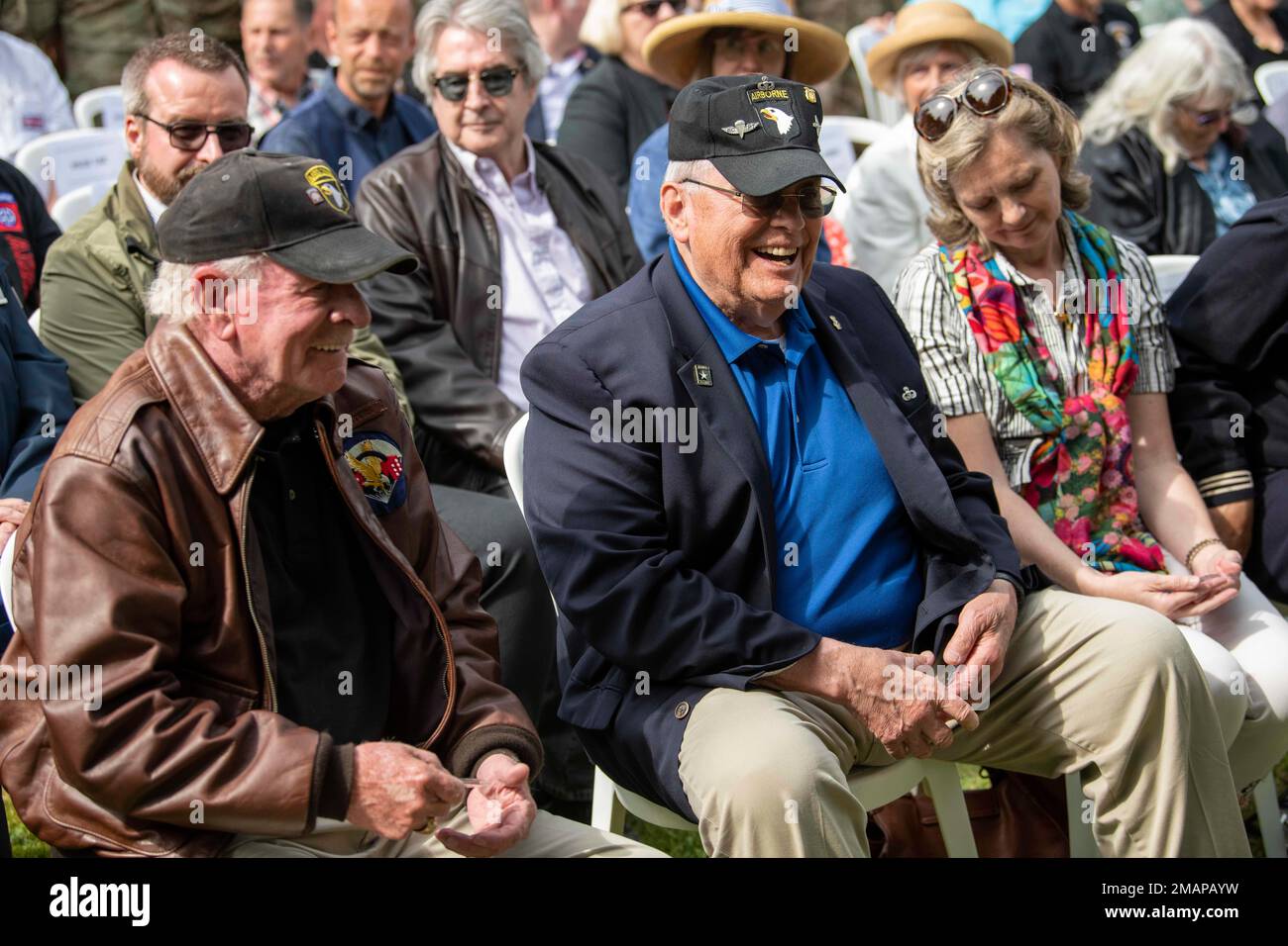 World War II veterans share a laugh after being presented a challenge ...