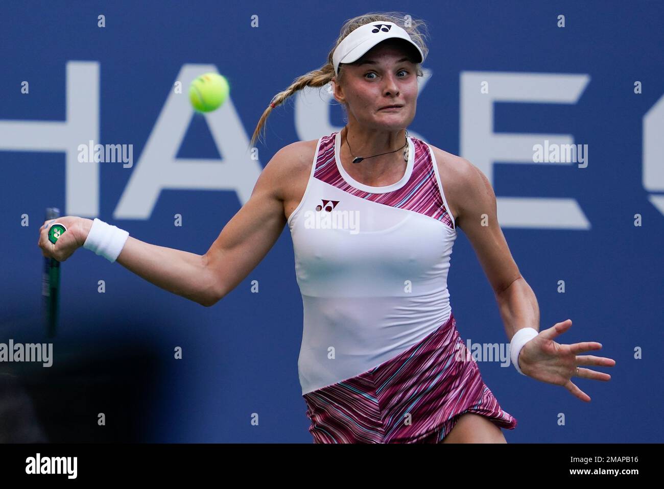 Dayana Yastremska, of Ukraine, returns a shot to Madison Keys, of the ...