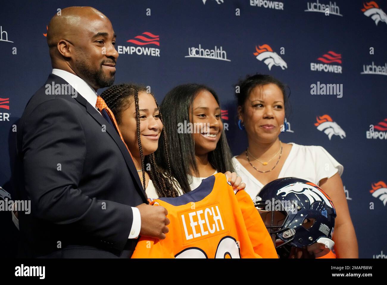 From left to right, Damani Leech, the new president of the Denver ...