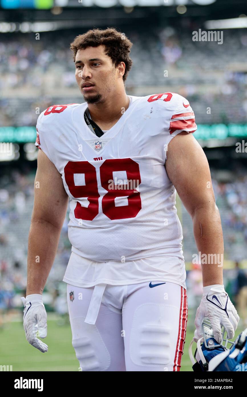 New York Giants defensive tackle D.J. Davidson (98) walks off the field ...