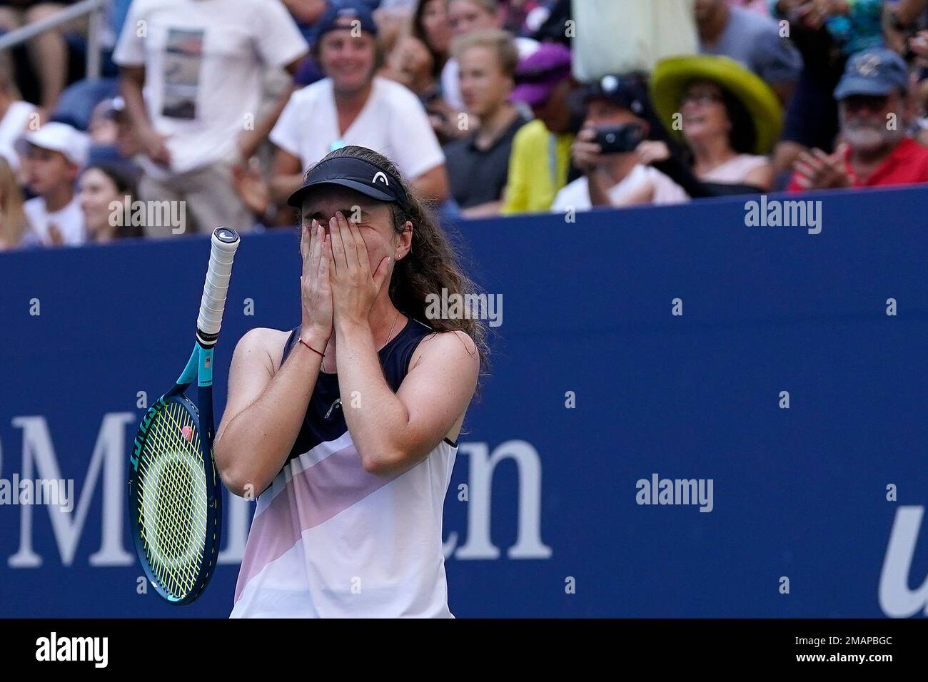 Daria Snigur, of Ukraine, reacts after upsetting Simona Halep, of ...