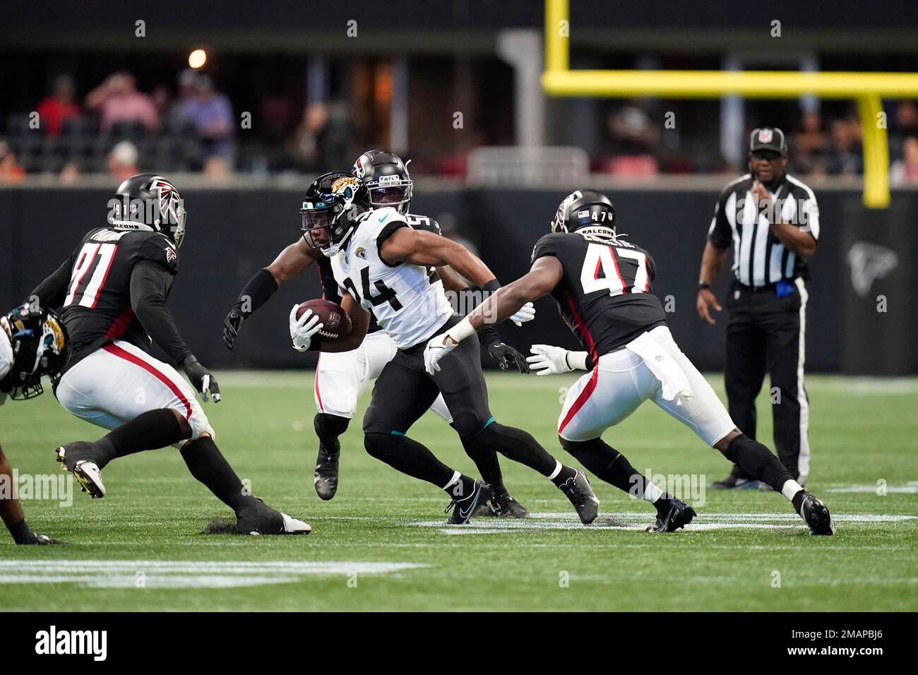 Jacksonville Jaguars running back Snoop Conner (24) carries between ...