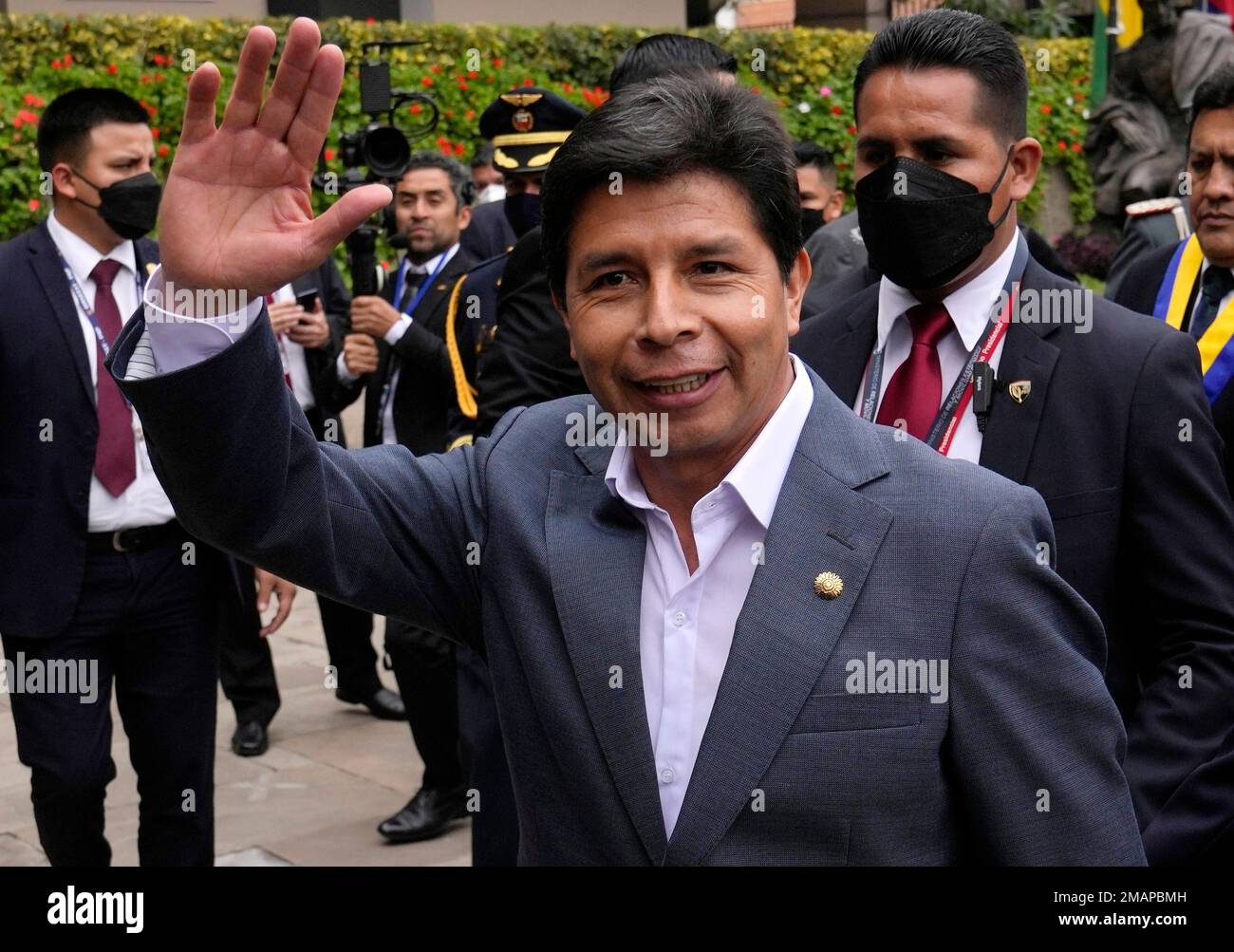 Perus President Pedro Castillo Waves To The Press After Posing For A