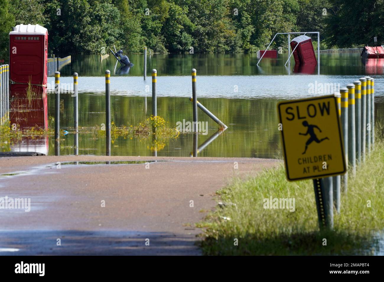 Looking more like a boat ramp, the receding Pearl River flood waters ...
