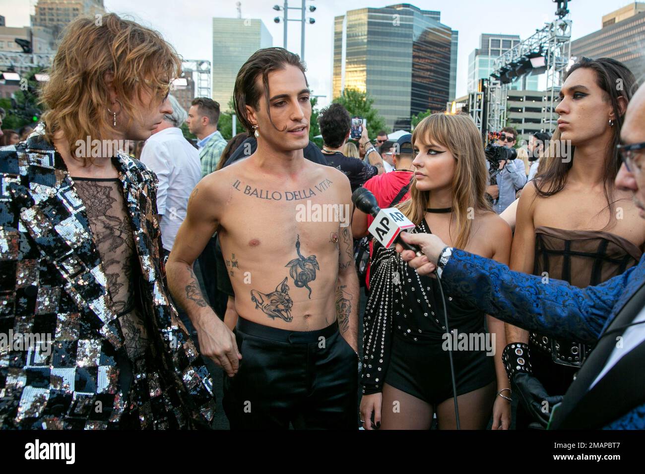 Italian glam rock band Maneskin, from left, guitarist Thomas Raggi ...