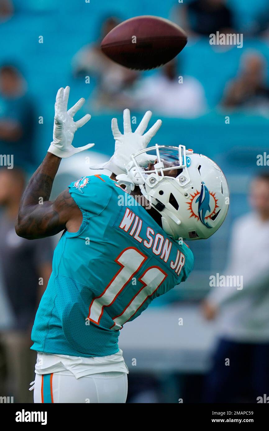 Miami Dolphins wide receiver Cedrick Wilson Jr. catches a pass as he ...