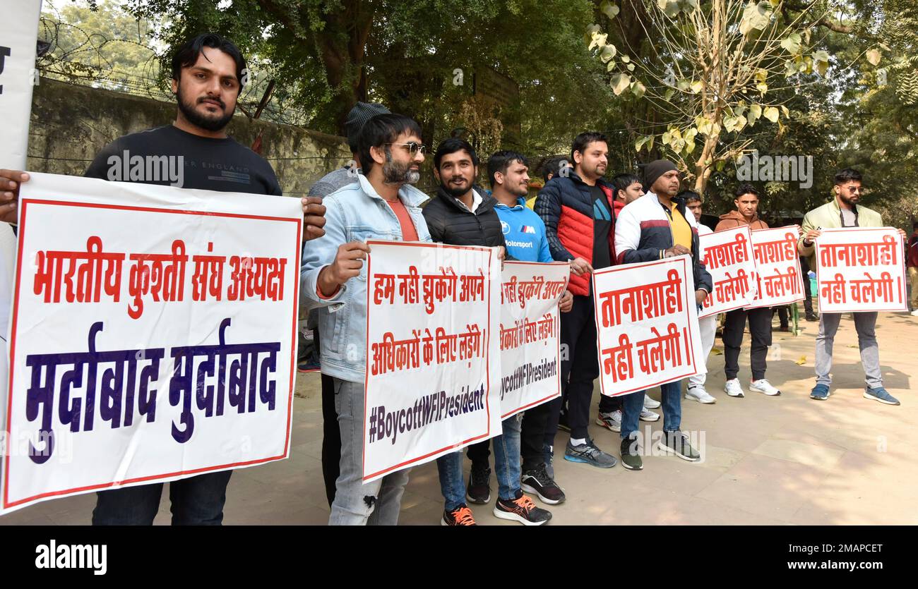 NEW DELHI, INDIA - JANUARY 19: Wrestlers pose with placards during ...