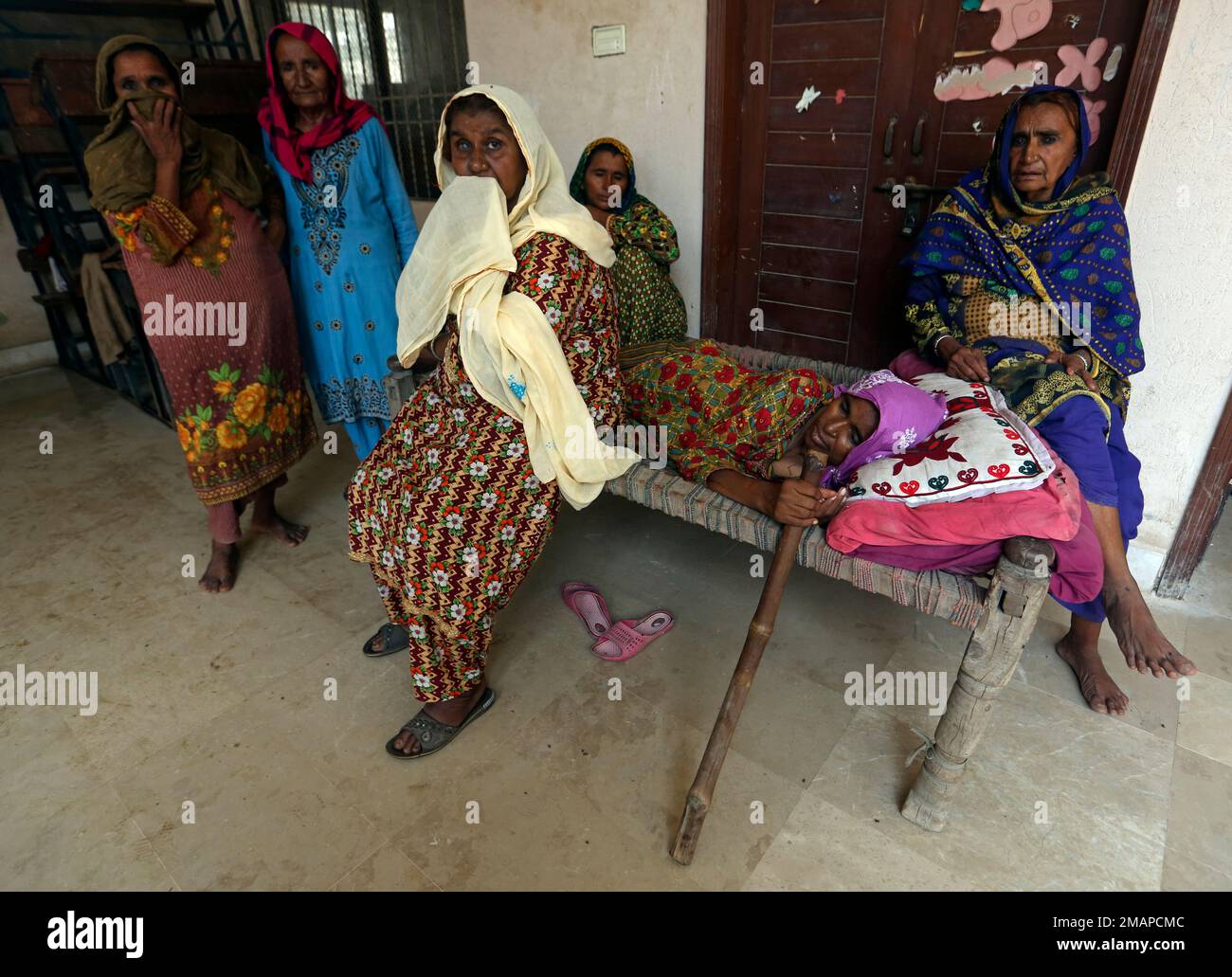 Displaced Pakistani women take refuge in a government college building ...