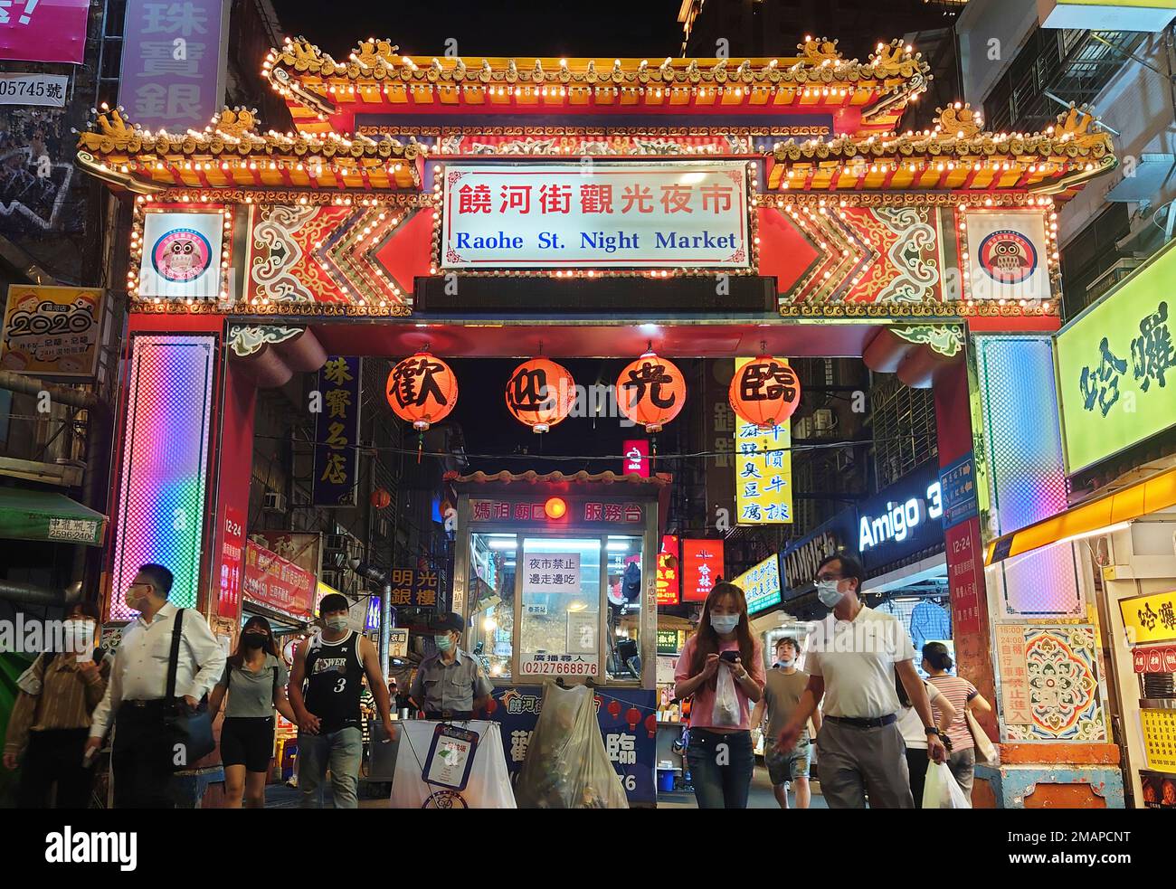 People wear face masks to protect against the spread of the coronavirus ...