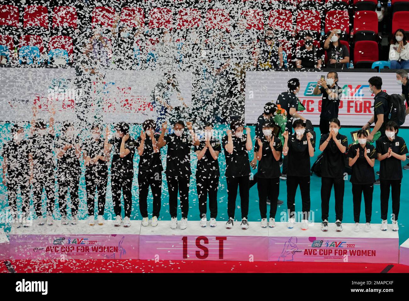 Confetti falls on gold medalists Japanese team during awarding ...