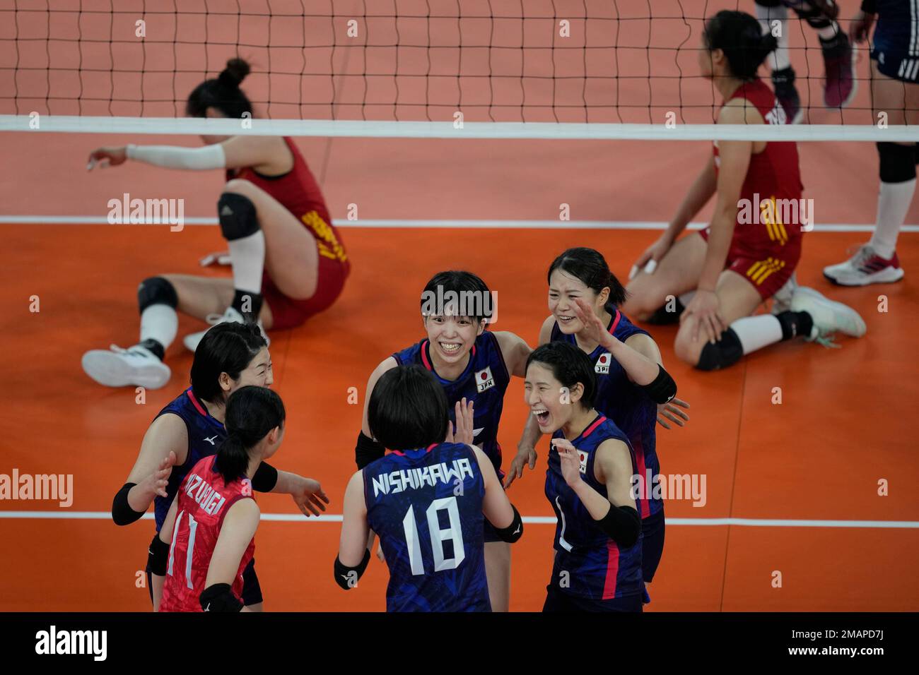 Japanese players reacts after a score during their gold medal match ...