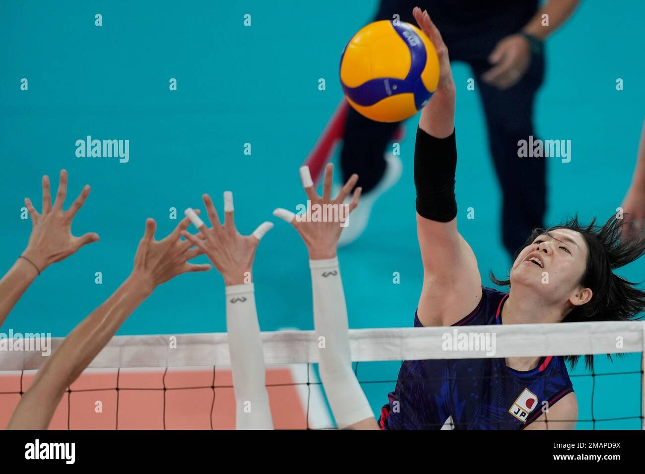 Japan's Mizuki Tanaka hits the ball during their gold medal match ...