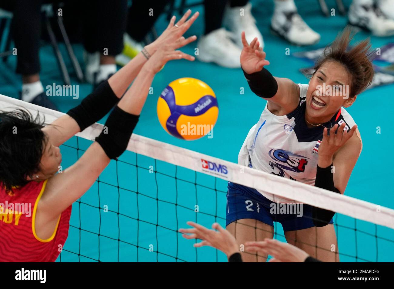 Thailand's Thanacha Sooksod, right, hits the ball during their match ...