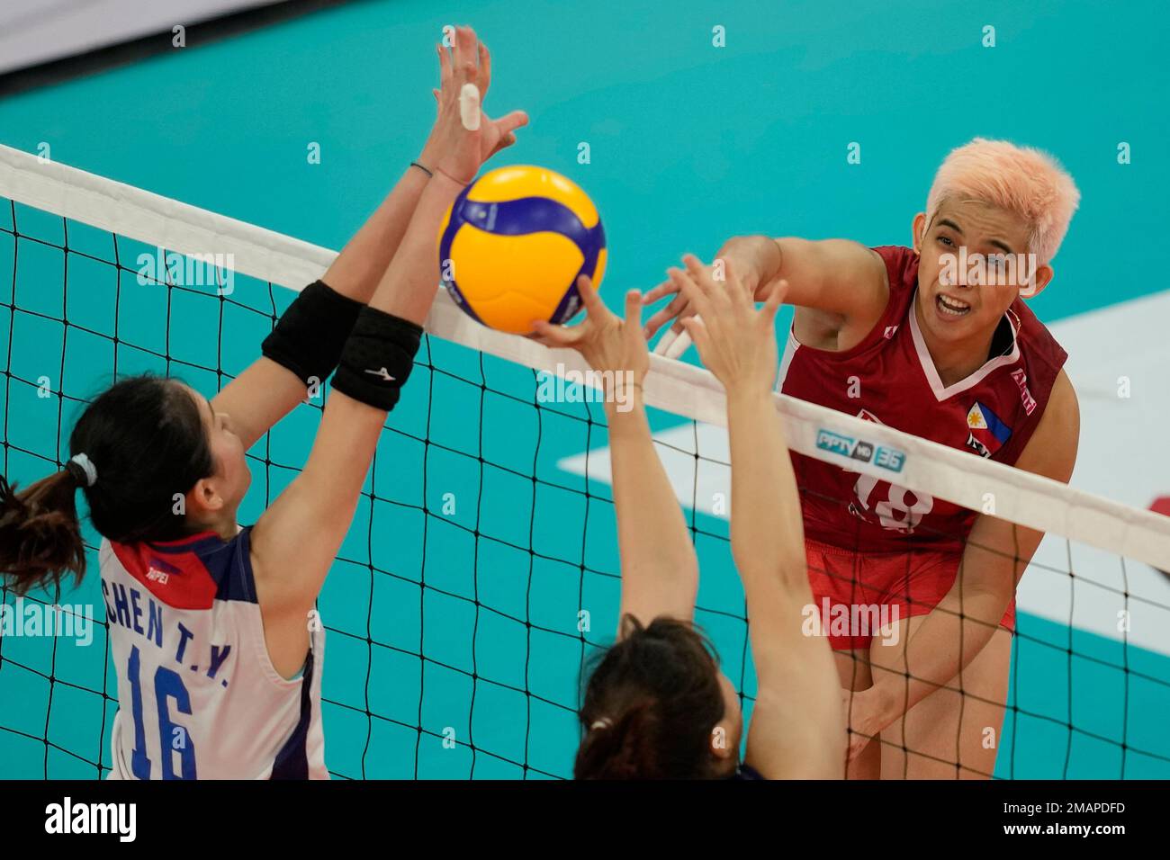 Philippines' Diana Mae hits the ball during medal round match against ...